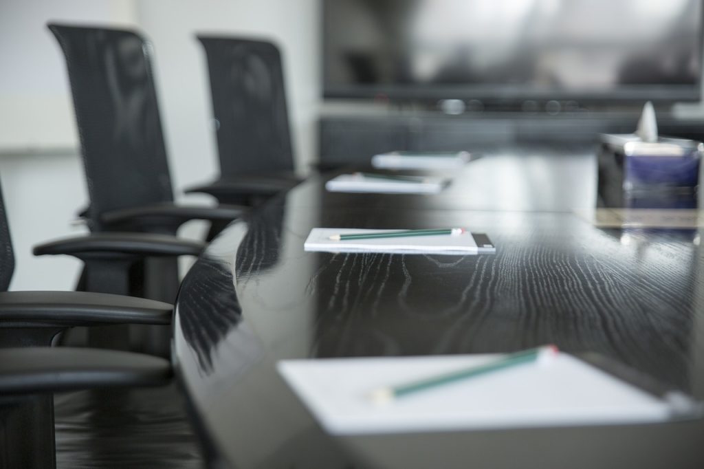 What are the key differences between board meetings and general meetings?